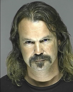 Murder case witness and accused felon at large in Inyo